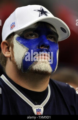 A Dallas Cowboys fan watches play against the Chicago Bears late in the ...