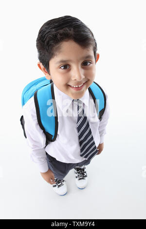 Full length photo of small schoolboy graduation hat teacher hold ...