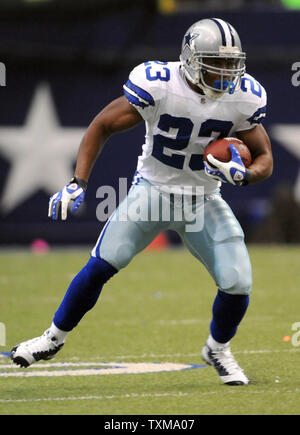 Dallas Cowboys running back Tashard Choice (23) is tossed in the first ...