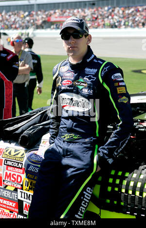 Kyle Busch waits for the start of the NASCAR Cup Series auto race ...