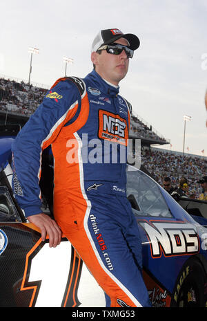 Kyle Busch waits for the start of the NASCAR Cup Series auto race ...
