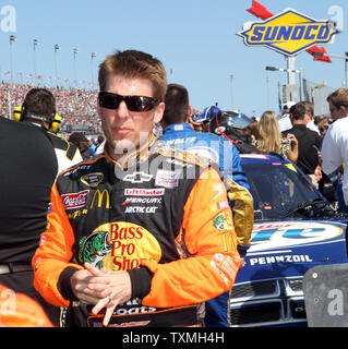 Jamie Dick walks down pit road during qualifying for the NASCAR ...