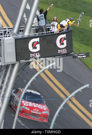 Tony Stewart takes the checkered flag in the Bass Pro Shops 500 NASCAR ...