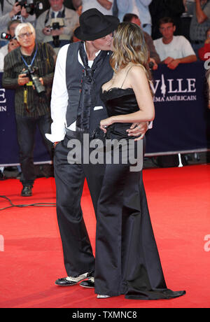 Actress Mira Sorvino and her husband, actor Christopher Backus, arrive ...