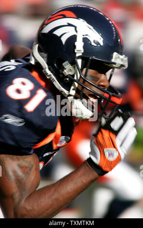 Denver Broncos wide receiver Charlie Adams (81) fights off rookie ...