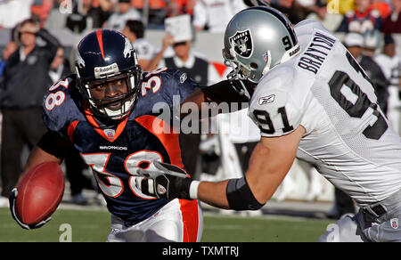 Denver Broncos running back Tyler Badie runs for a long gain in the ...