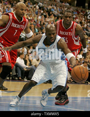 Houston Rockets guard David Wesley (7) sits and looks at referee Joe ...