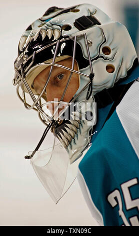 San Jose Sharks goalie Vesa Toskala, left, of Finland, waits for a shot ...