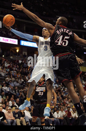 Former Philadelphia 76ers Allen Iverson looks on during an NBA ...