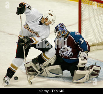 Anaheim Ducks left wing Chris Kreider, left, battles Ottawa Senators ...
