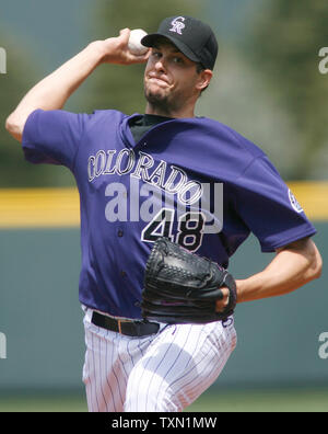 Colorado Rockies pitcher Jason Hirsh throws against the Cincinnati Reds ...