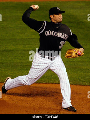 Colorado Rockies starting pitcher Josh Fogg reacts as he sits in the ...