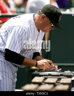 Colorado Rockies manager Clint Hurdle waits in the dugout for the start ...