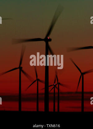 FILE - Wind turbines stand in various stages of completion near ...
