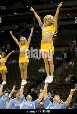 Denver Nuggets cheerleaders perform in the first half of a preseason ...
