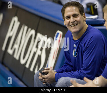 Dallas Mavericks team owner Mark Cuban walks to his seat during the ...