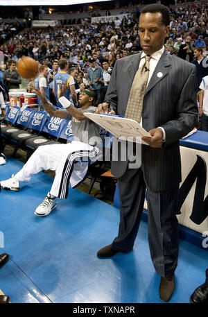 Portland Trail Blazers interim head coach Tiago Splitter looks up at ...