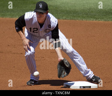 Colorado Rockies second baseman Clint Barmes (12) breaks up a double ...