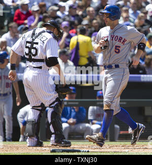 Colorado Rockies catcher Ramon Hernandez tags out New York Mets' Ruben ...
