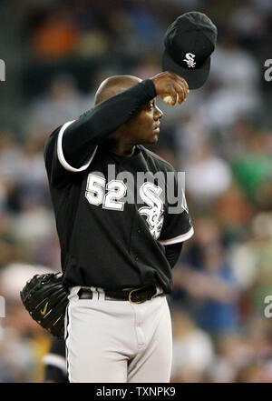 Chicago White Sox pitcher Sean Burke (59) looks at the ball as he ...