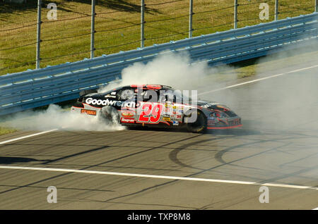 Kevin Harvick, in car Number 29, exits a turn at the NASCAR NEXTEL Cup ...