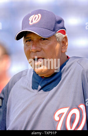 Washington Nationals coach Pat Corrales walks in the dugout before a ...