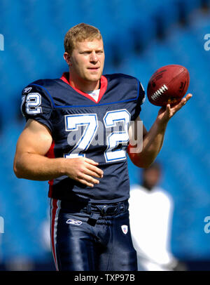 Buffalo Bills defensive end Ryan Denney, right, battles tight end ...