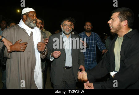 Hamas new leader Abdel Aziz Rantisi is greeted by his supporters in ...
