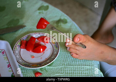 A Palestinian girl, nine-year-old Aya Wael Masoud (C), who was born ...