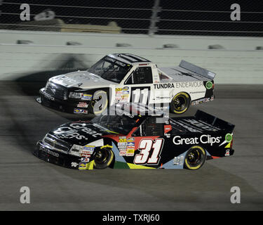Drivers compete in the 2012 NASCAR Camping World Truck Series Race at ...