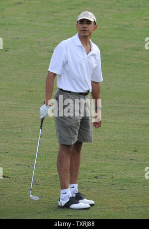28 December 2010 - Honolulu, Hawaii - President Barack Obama cheers on ...