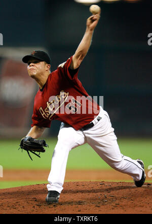 Houston Astros starting pitcher Wandy Rodriguez reacts after retiring ...