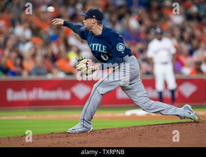 Seattle Mariners pitcher Casey Lawrence throws against the Miami ...
