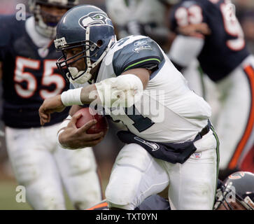 Seattle Seahawks running back Shaun Alexander is surrounded by media at ...