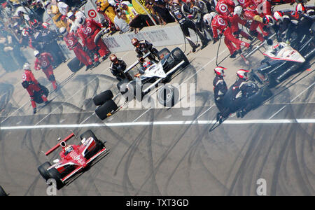 Scott Dixon pulls in the pit for fuel during the Firestone Indy 300 at ...