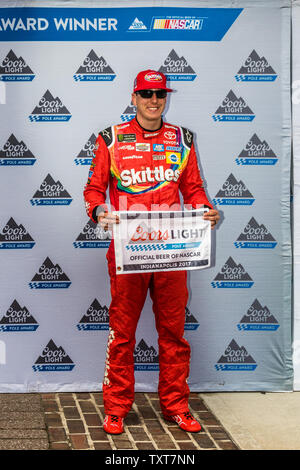 Kyle Busch celebrates after winning a NASCAR Cup Series auto race at ...