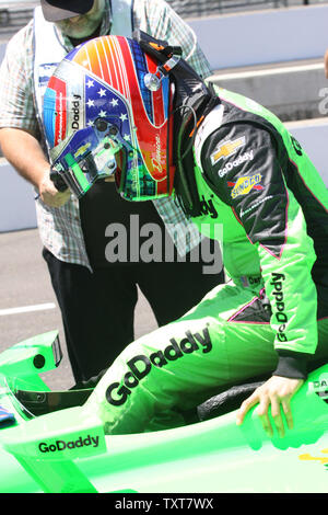 Danica Patrick climbs into her race car before the start of the ...