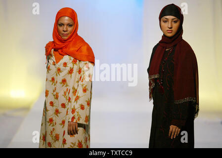 An Iranian model wears an Islamic dress made by Iranian designers at a ...