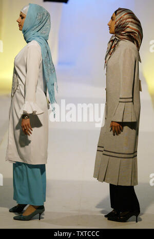 An Iranian model wears an Islamic dress made by Iranian designers at a ...