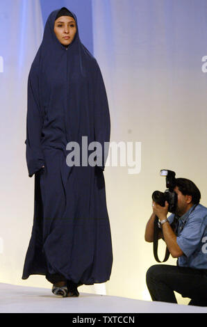 An Iranian model wears an Islamic dress made by Iranian designers at a ...
