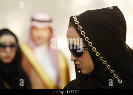 (L-R) Saudi Arabian ambassador to Iran Osamah Al-Sanosi, princess Nauf ...