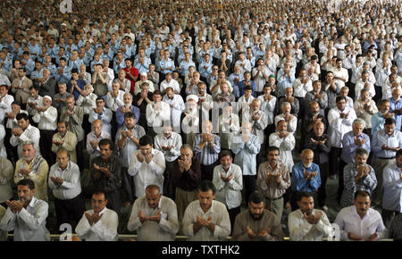 Iranian worshipers pray during Friday Prayer at Tehran University ...