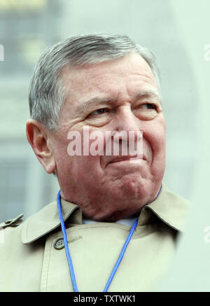 Former U.S. Attorney General John Ashcroft (L) watches as his wife ...