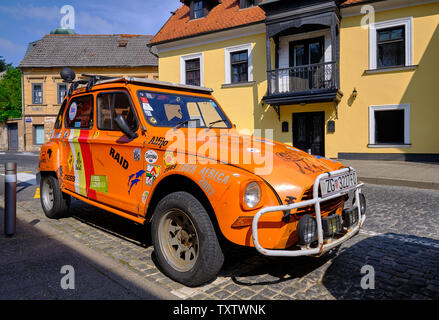 Orange Citroen 2CV (number 34) covered in expedition and meeting ...