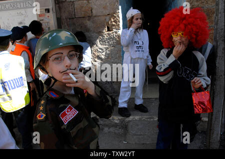 Ultra-Orthodox children smoke cigarettes and wear costumes on the ...