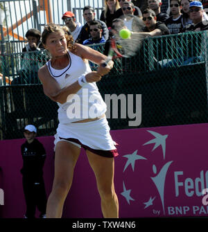 Israel's Shahar Peer returns the ball to Denmark's Caroline Wozniacki ...