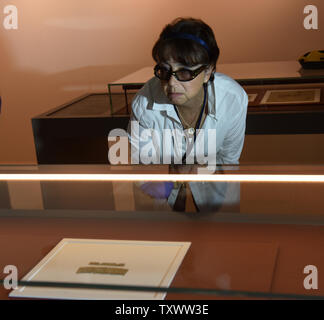 Elena Libman, Head of the Dead Sea Scrolls Conservation Lab, looks at a ...