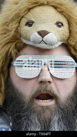 Fans look on before an NFL football game between the Chicago Bears and ...