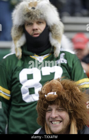 Fans look on before an NFL football game between the Chicago Bears and ...