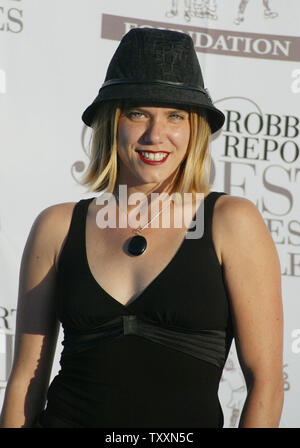 Actress Becky Wahlstrom poses for photographers during the Robb Report ...